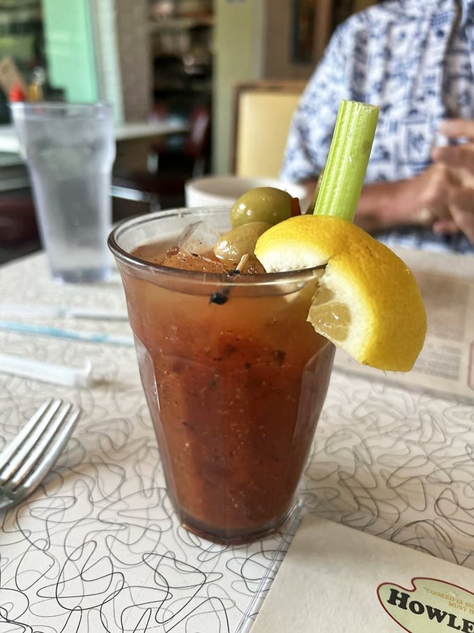 This Bloody Mary isn't just a drink—it's a meal with a kick, complete with the holy trinity of garnishes: celery, olive, and lemon.