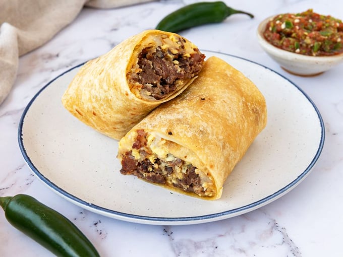Steak and eggs find their perfect home in this burrito masterpiece. It's what cowboys would eat if they had better taste and lived in Burbank.