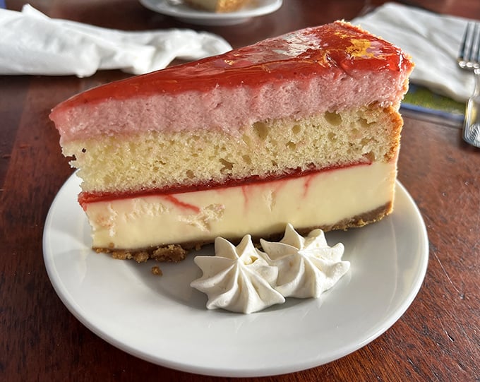 This isn't just dessert—it's therapy with a fork. Strawberry shortcake meets cheesecake in a romance sweeter than any Hallmark movie you've ever watched.