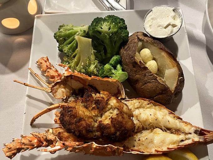 The lobster doesn't just share the restaurant's name—it earns top billing with this split and stuffed presentation that makes you wonder why you'd ever order anything else.