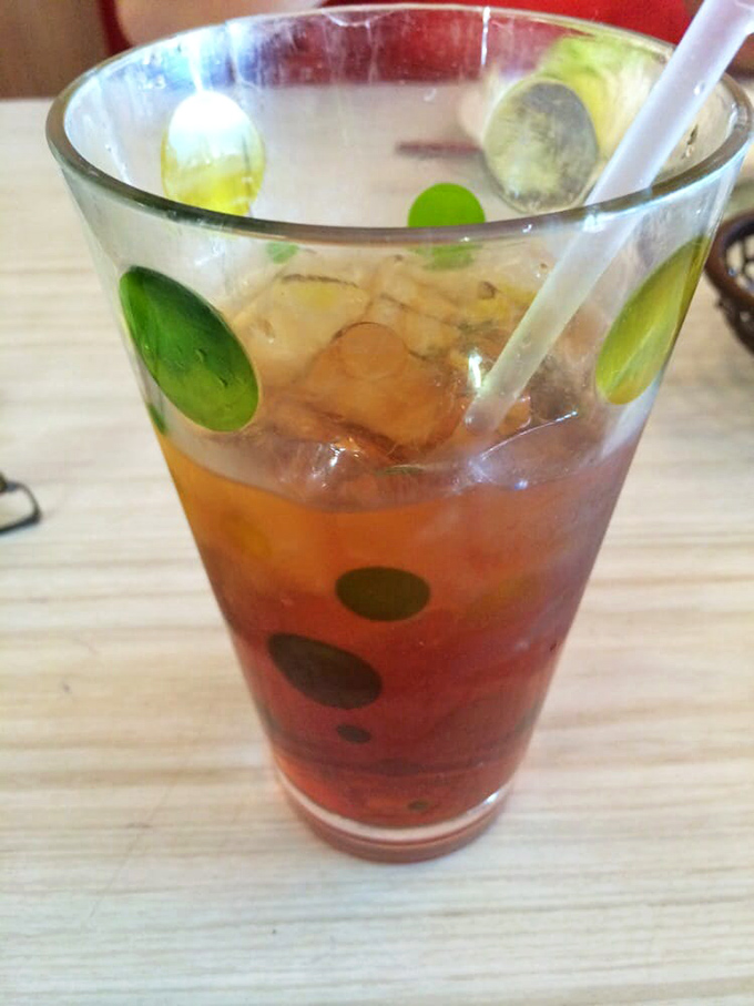 Sweet tea served in a glass with personality. In the South, this isn't just a beverage—it's practically a constitutional right.