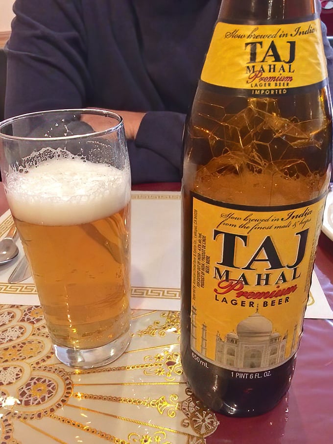 Nothing complements the fire of Indian spices quite like the cool embrace of a Taj Mahal lager—architectural perfection in liquid form.