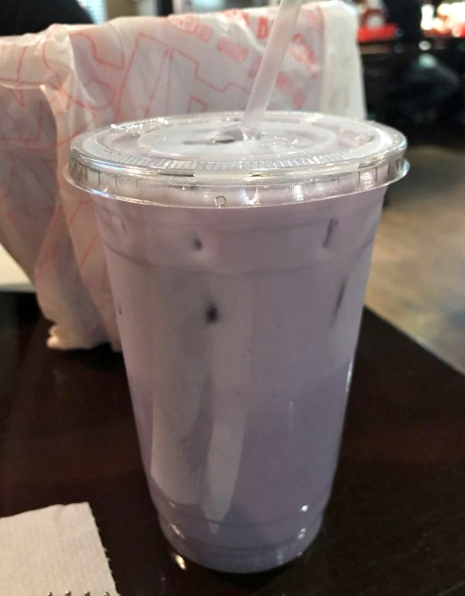 This taro milk tea isn't just a drink—it's the perfect cool-down companion when your taste buds have been doing the spice dance.
