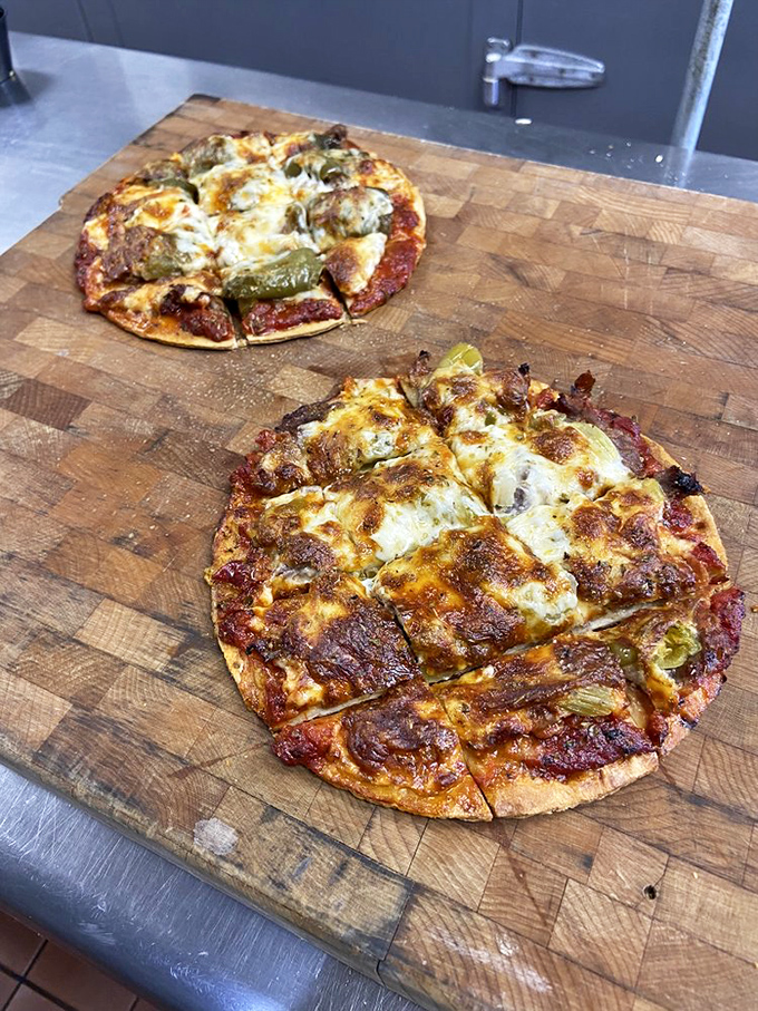 Tavern-style pizzas with that perfect thin crust – cut into squares because circles are overrated when it comes to Chicago-style pizza geometry.