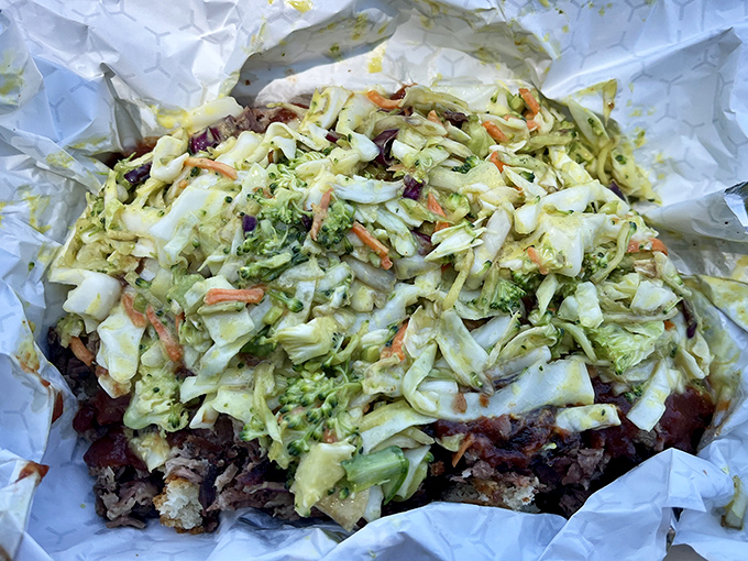 The Texas Crippler isn't just a sandwich – it's a glorious mountain of meat and slaw that requires both strategy and napkins to conquer.