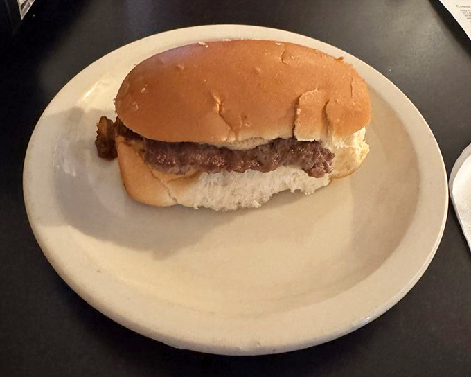 The Texas Hamburger – where beef meets that legendary chili sauce in a union so perfect it should have its own anniversary celebration.