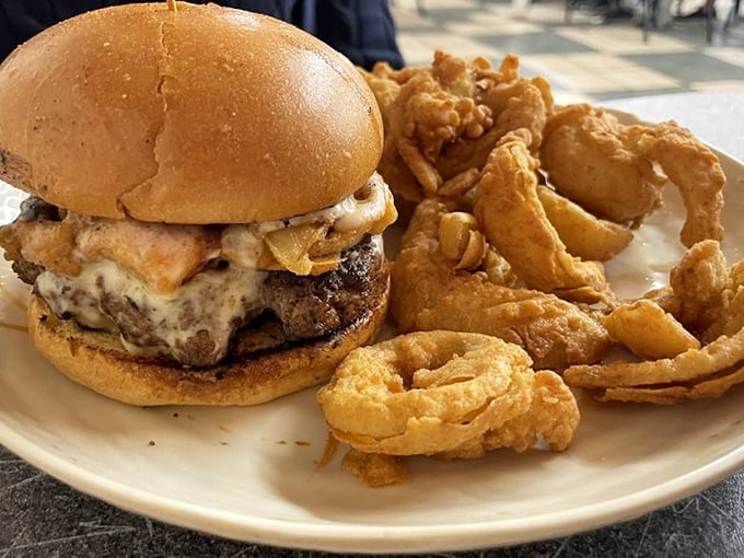 The Hoss burger arrives with onion rings that could make a grown person weep with joy. Diet plans, consider yourself postponed.
