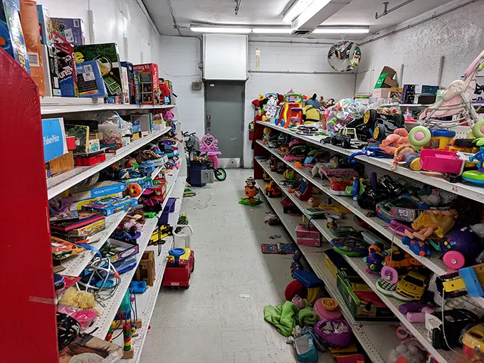 Toy Story comes to life in this aisle. Plastic heroes and forgotten games await adoption, ready to spark imagination in their second chapter.