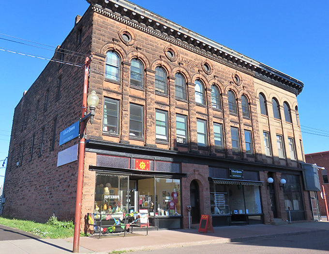 The V. Coppo Block building stands as a testament to when storefronts had personality and weren't just glass boxes waiting for the next tenant.