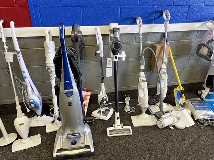 More vacuum cleaners than a cleaning supply convention, each one eager for dust bunny duty.