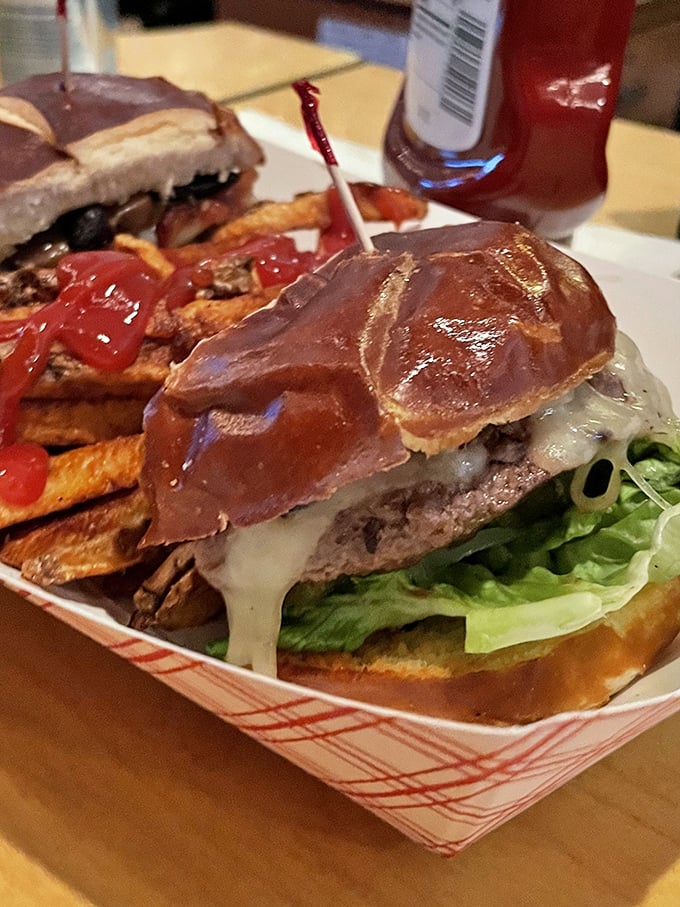 A cheeseburger that doesn't need to show off, just deliver. Those golden fries aren't side characters—they're co-stars in this delicious production.