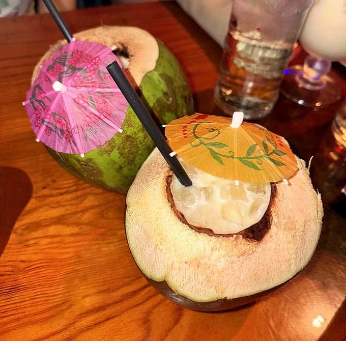Coconut drinks served in their natural containers—nature's sippy cups! Complete with tiny umbrellas that say "vacation starts now."