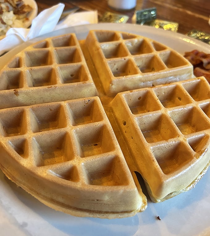 Waffles with architectural integrity that would make Frank Lloyd Wright proud—perfect grid patterns waiting for syrup to find its level.
