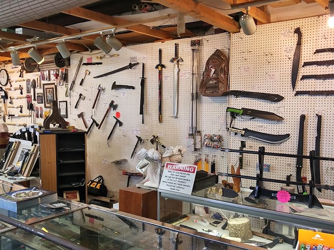 Sharp objects with even sharper stories—this wall of blades and tools represents craftsmanship from eras when things were built to last.