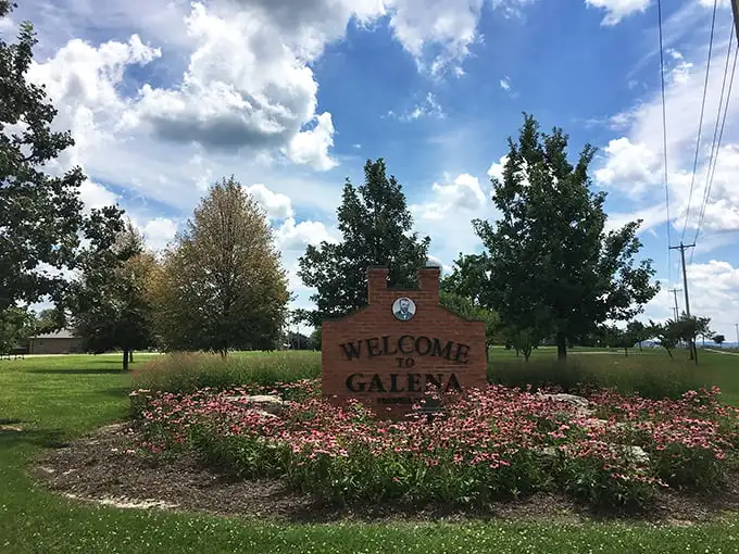 The welcome sign to Galena promises exactly what it delivers – a town where flowers bloom and time slows down just enough to notice.