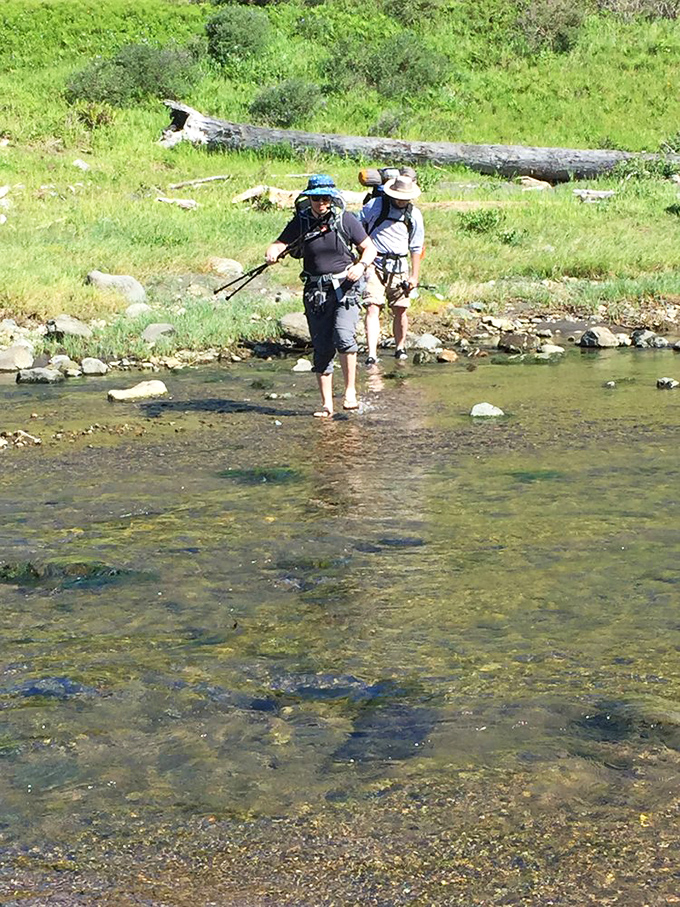Stream crossings: where hikers discover their balance isn't quite what their dating profile claimed. Nature's humbling moment.