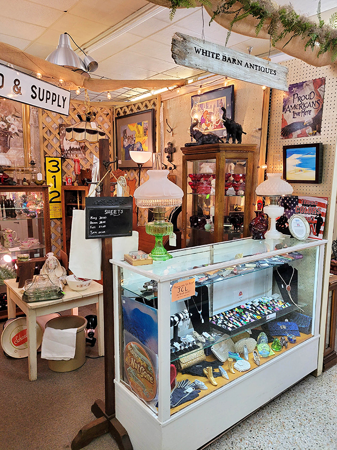 White Barn Antiques booth combines rustic charm with carefully curated treasures—like your stylish aunt's farmhouse got a PhD in organization.