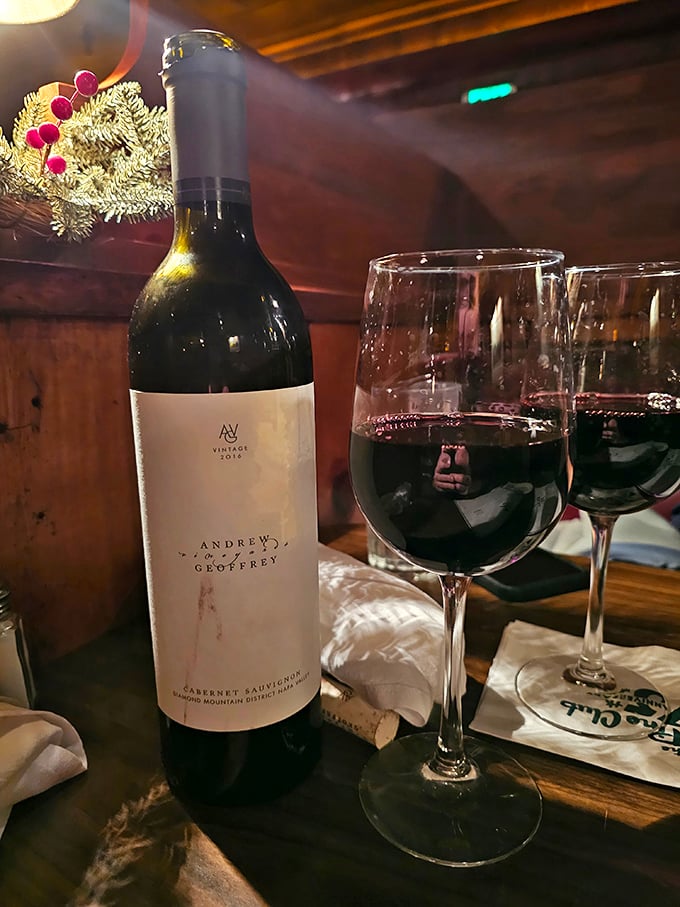 Wine isn't just served here—it's respected. A thoughtfully selected Cabernet stands ready to complement that perfectly aged beef.