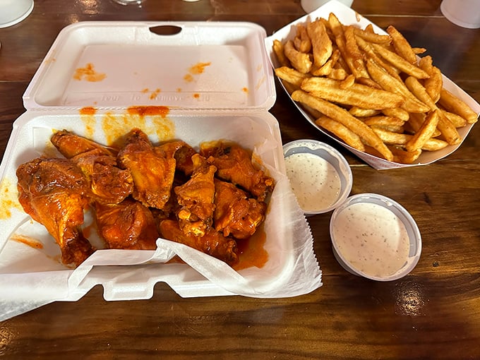 Buffalo wings that don't mess around—saucy, substantial, and served with cooling dips that provide the perfect flavor counterpoint to all that heat.