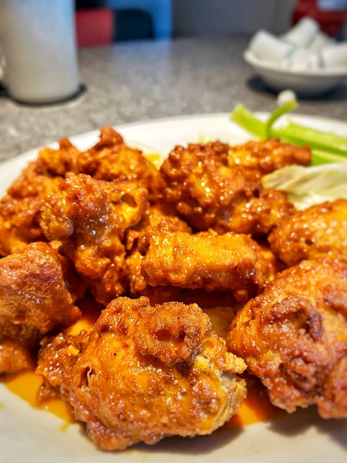 These wings aren't messing around—they're the kind that make you involuntarily close your eyes with each bite. Napkins: mandatory. Regrets: none.