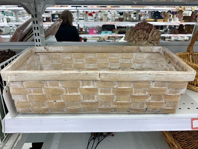 This humble basket once cradled someone's precious items—now it waits patiently for your knick-knacks to give it purpose again.
