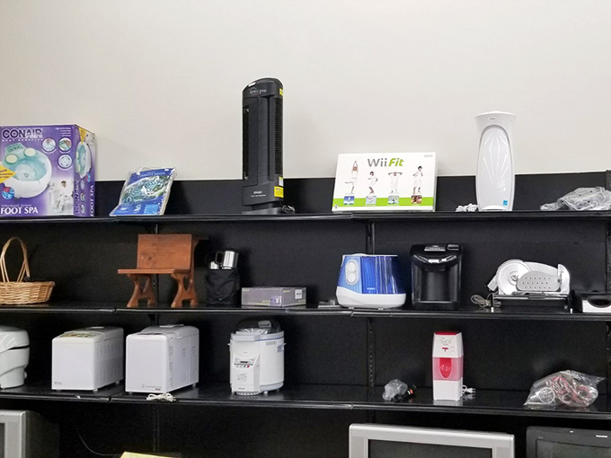 The electronics section—where yesterday's "must-have" gadgets await their second chance. That Wii Fit could finally fulfill its destiny!