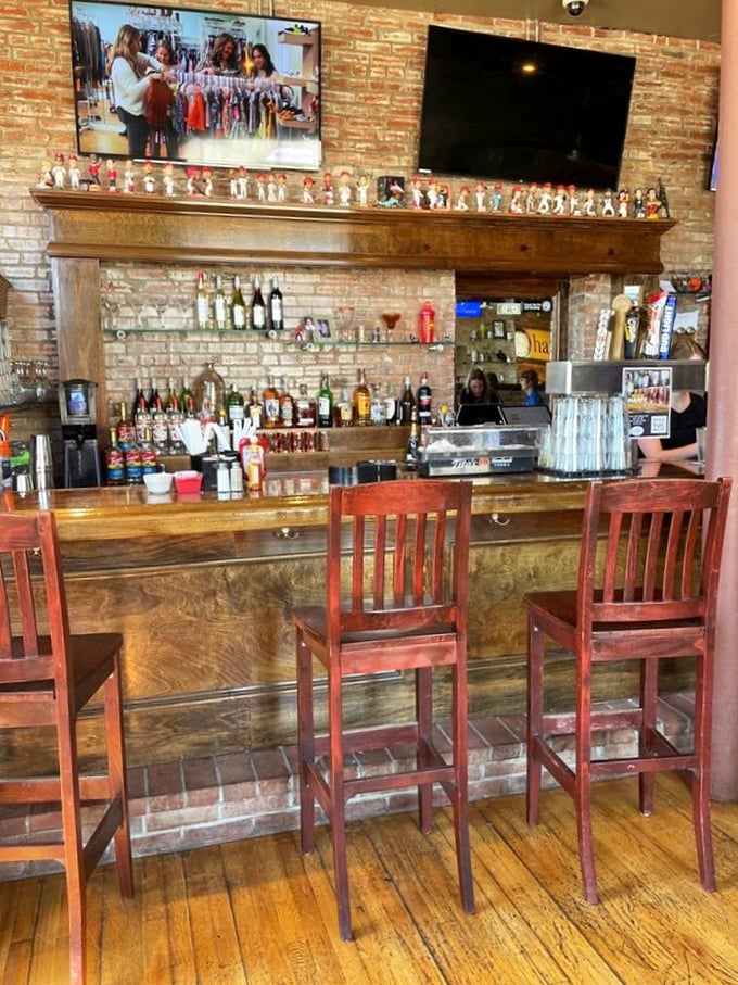 The bar area doesn't just promise mimosas and Bloody Marys—it delivers them in a setting that makes 10am cocktails seem perfectly reasonable.