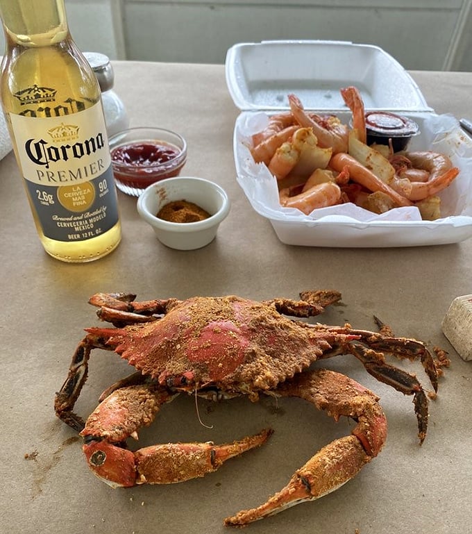 The unofficial pairing: ice-cold Corona and perfectly seasoned crab. Some marriages are made in heaven; this one was made in Fenwick Island.