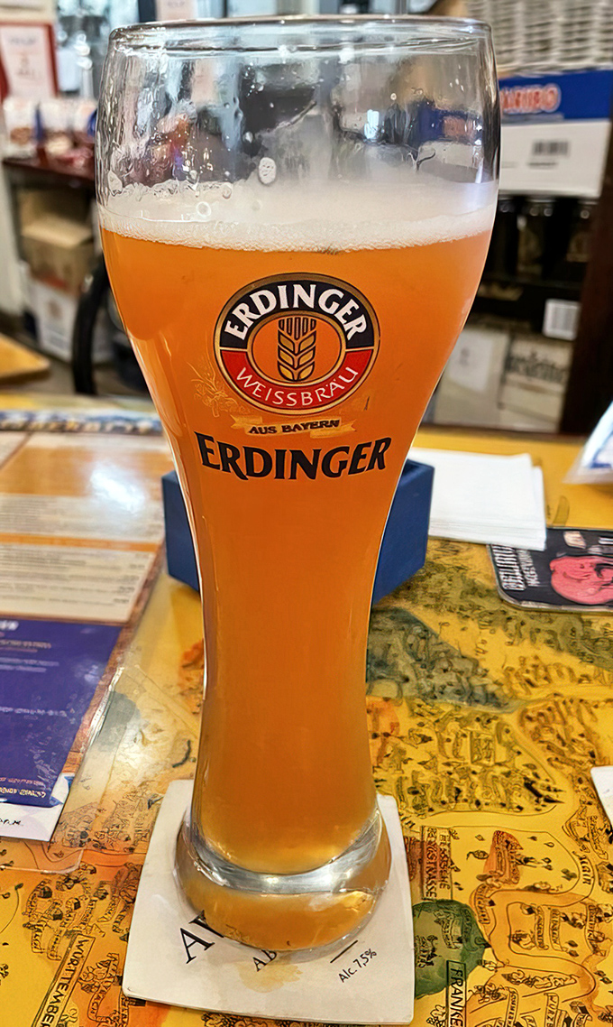 Not all heroes wear capes—some wear foam crowns in perfectly shaped Erdinger glassware. This golden wheat beer practically glows with Bavarian pride.
