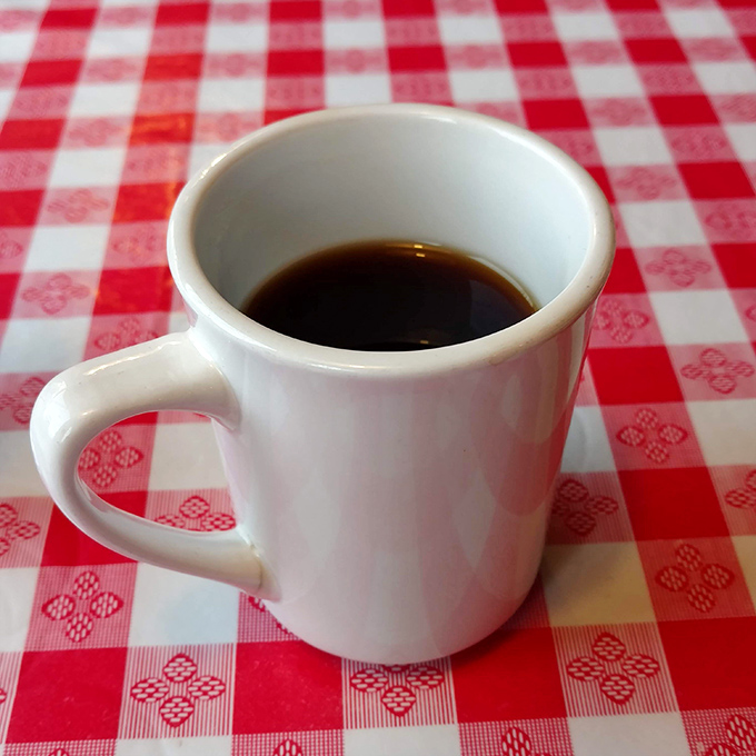 The humble diner coffee mug—unassuming yet mighty. No fancy latte art needed when the coffee is this honest and straightforward.