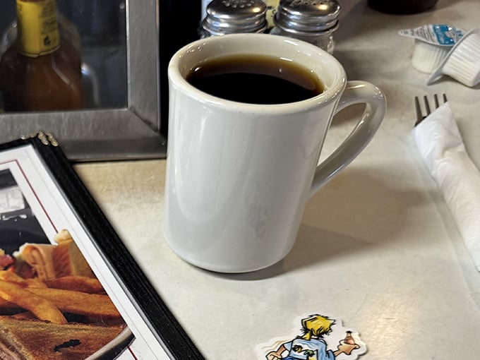 The humble diner mug—holding what might be the most honest cup of coffee in Virginia, no foam art required.
