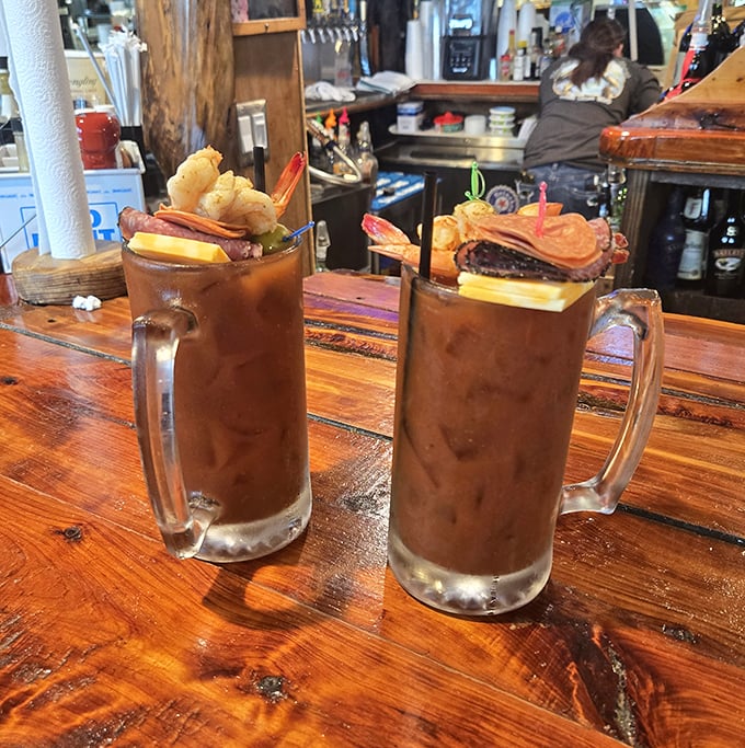 Bloody Marys topped with shrimp—because drinking your vegetables is better when seafood is involved. Breakfast of champions or lunch of legends?