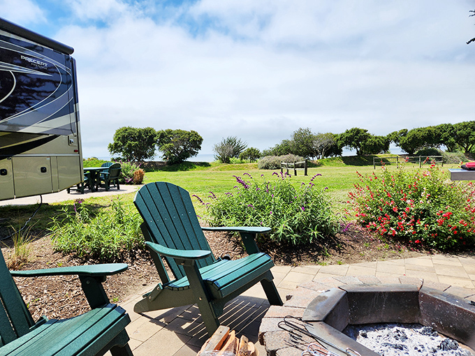 Adirondack chairs surrounding a fire pit—where stories get better, marshmallows get toasted, and worries get smaller.