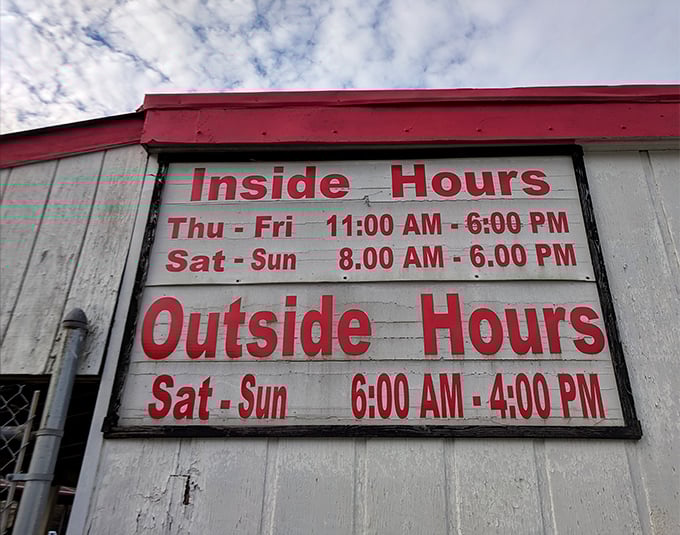 The hours sign reads like a secret code for bargain hunters—early birds get first pick, but afternoon shoppers score the desperate deals.