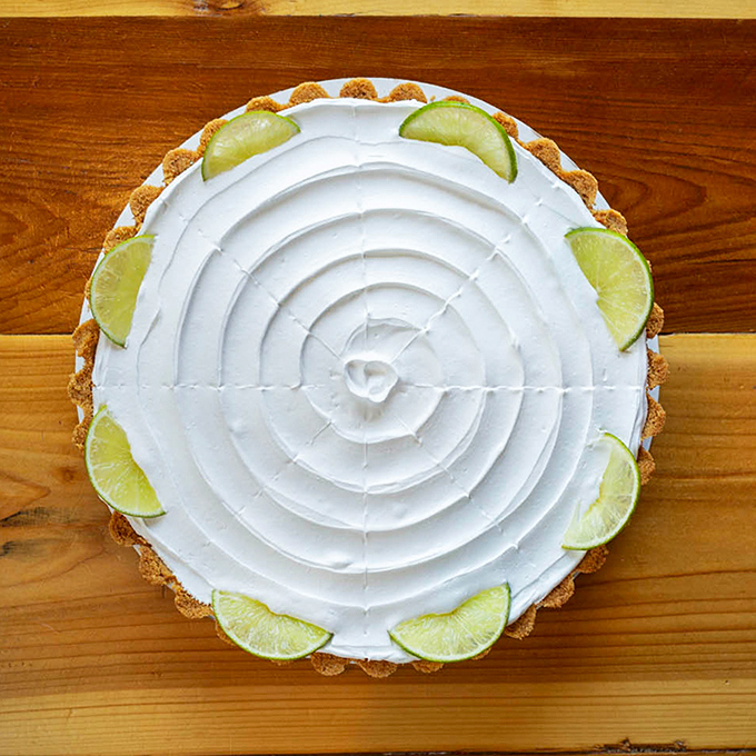 This key lime pie isn't just dessert—it's a vacation on a plate. The perfect sweet-tart finale that makes you wonder why you'd ever waste calories on lesser desserts.