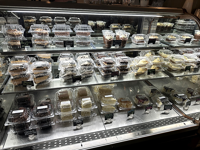 The dessert case – where willpower goes to die and "I'll just have a bite" becomes the lie we tell ourselves.
