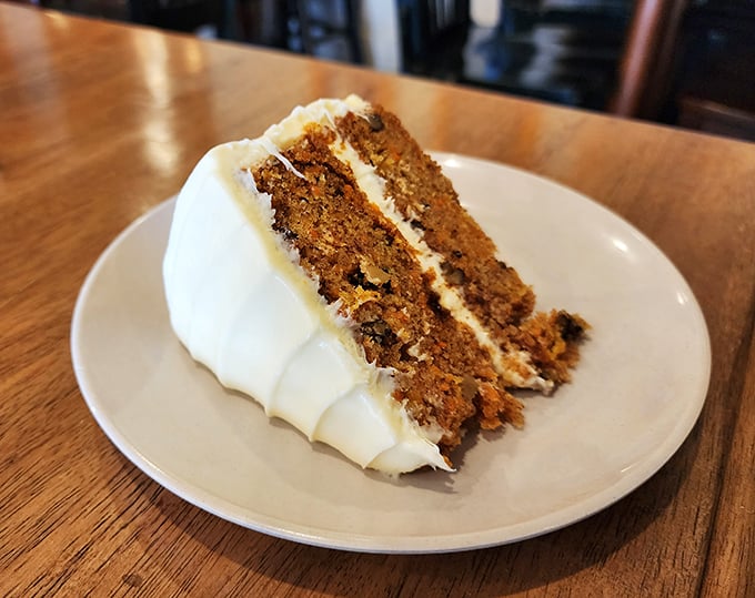 Carrot cake that somehow manages to convince you it's practically a vegetable. That cream cheese frosting could make anyone believe in love again.