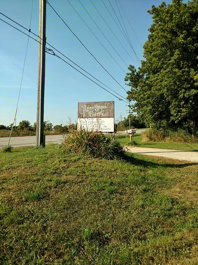 The unassuming roadside sign offers the only hint that beyond these trees lies a slice of medieval Europe in the heart of Illinois.