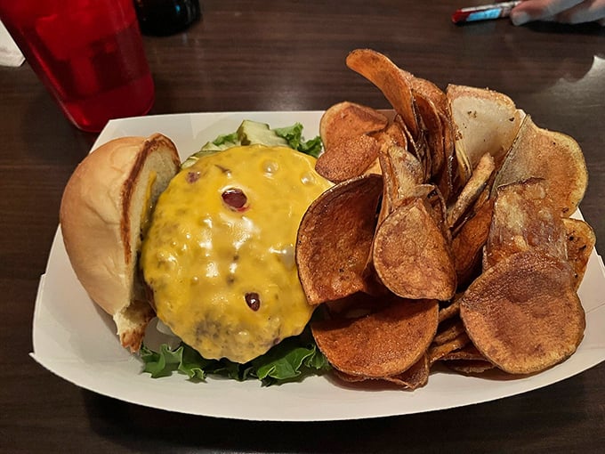 A classic cheeseburger on a pretzel bun with hand-cut fries – sometimes simplicity is the ultimate sophistication.