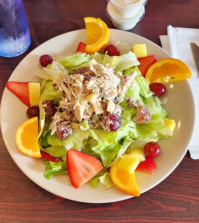 A chicken salad that actually makes you want to eat healthy – fresh greens, seasonal fruit, and protein that doesn't feel like punishment.