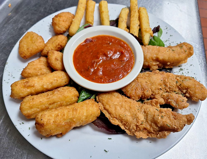 Not just chicken tenders—these are chicken confidence-boosters, crispy on the outside, juicy within, and that marinara means business.