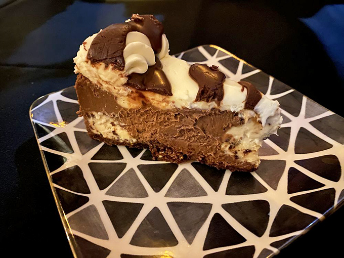 This chocolate cheesecake doesn't just end your meal—it provides closure so satisfying you'll be telling your therapist about it for weeks.