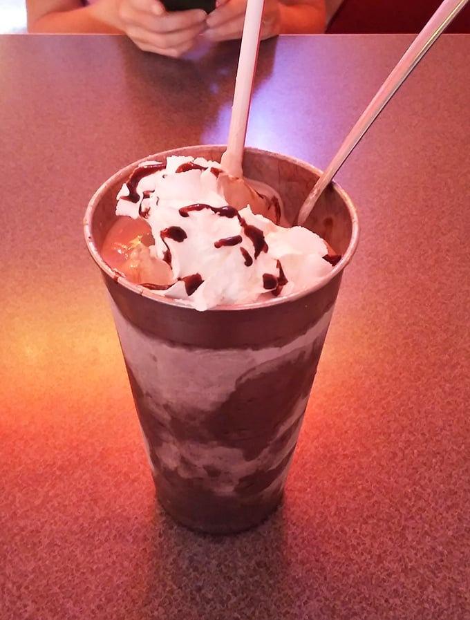 A chocolate milkshake so thick it fights the straw to a standstill. This isn't a drink—it's dessert with aspirations.