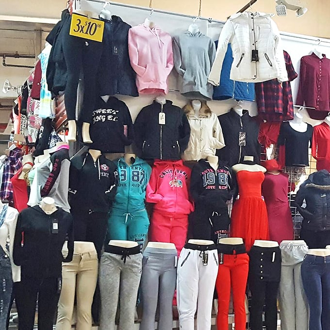 Fashion democracy in action—where stylish outfits hang ready to transform anyone into the best-dressed person at the quinceañera.