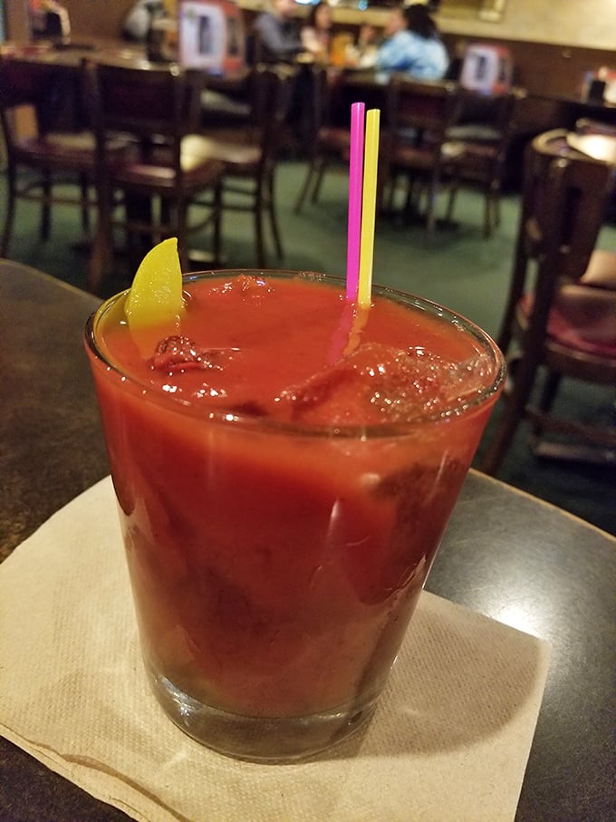 A proper Bloody Mary, garnished simply with lemon, not trying to be a salad bar in a glass like those newfangled versions downtown.