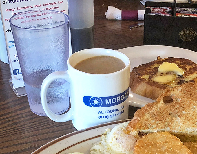 Coffee in a local business mug alongside golden French toast—the breakfast equivalent of a warm hug on a chilly Pennsylvania morning.