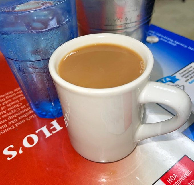 Coffee served exactly as it should be—strong, hot, and in a sturdy mug that feels like an old friend in your hands.