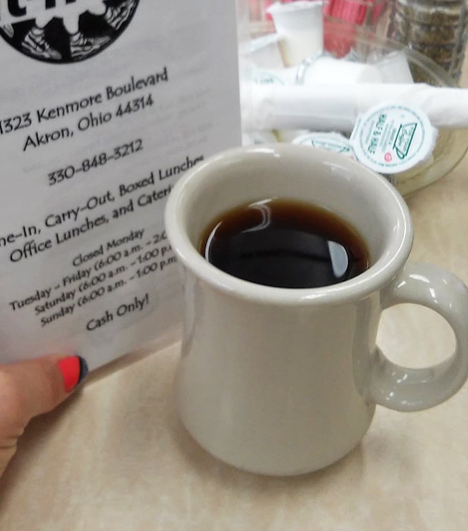 That sturdy diner mug doesn't just hold coffee; it cradles liquid motivation that's fueled Akron mornings for generations.