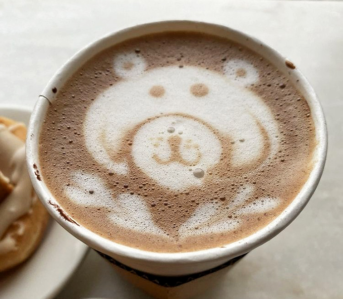 Latte art that smiles back at you – because even your coffee knows you made the right decision coming here.