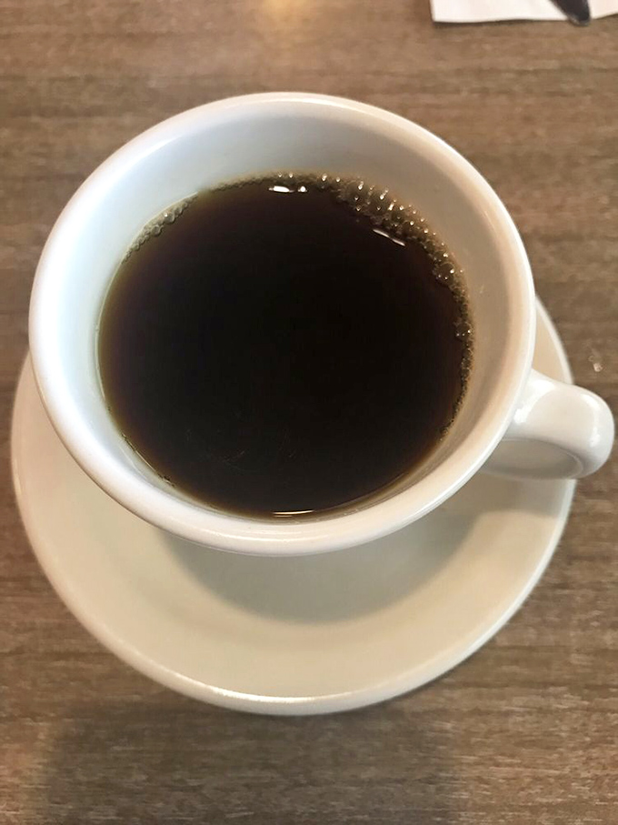 Coffee served in these white ceramic mugs somehow tastes better than anything in a cardboard cup, especially when accompanied by endless refills and local gossip.